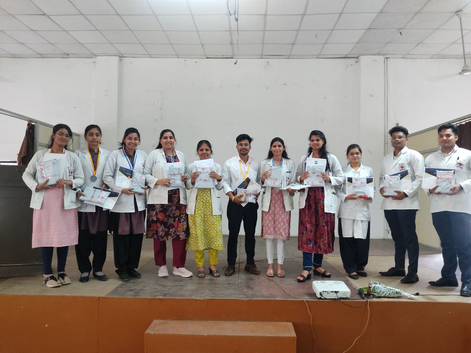 B Jain Gifted Books to College Rank Students at Anushree Homeopathic ...