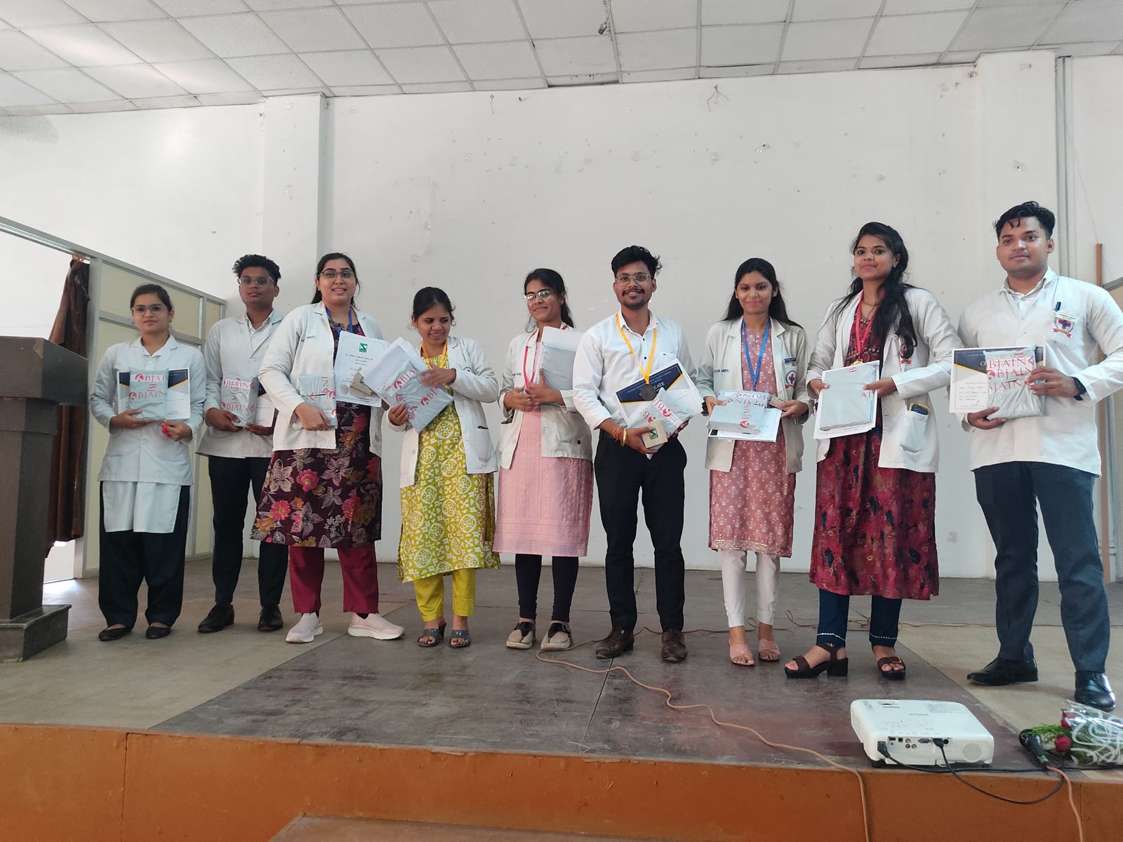 B Jain Gifted Books to College Rank Students at Anushree Homeopathic ...